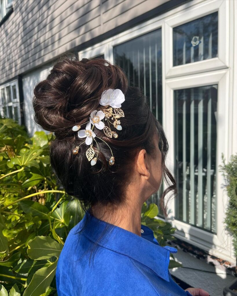 Chignon alto, come si fa e come portarlo | Trucchi.tv